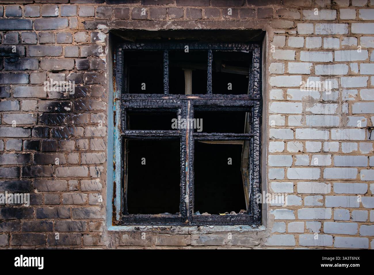 Window of burnt house. Consequences of fire Stock Photo - Alamy