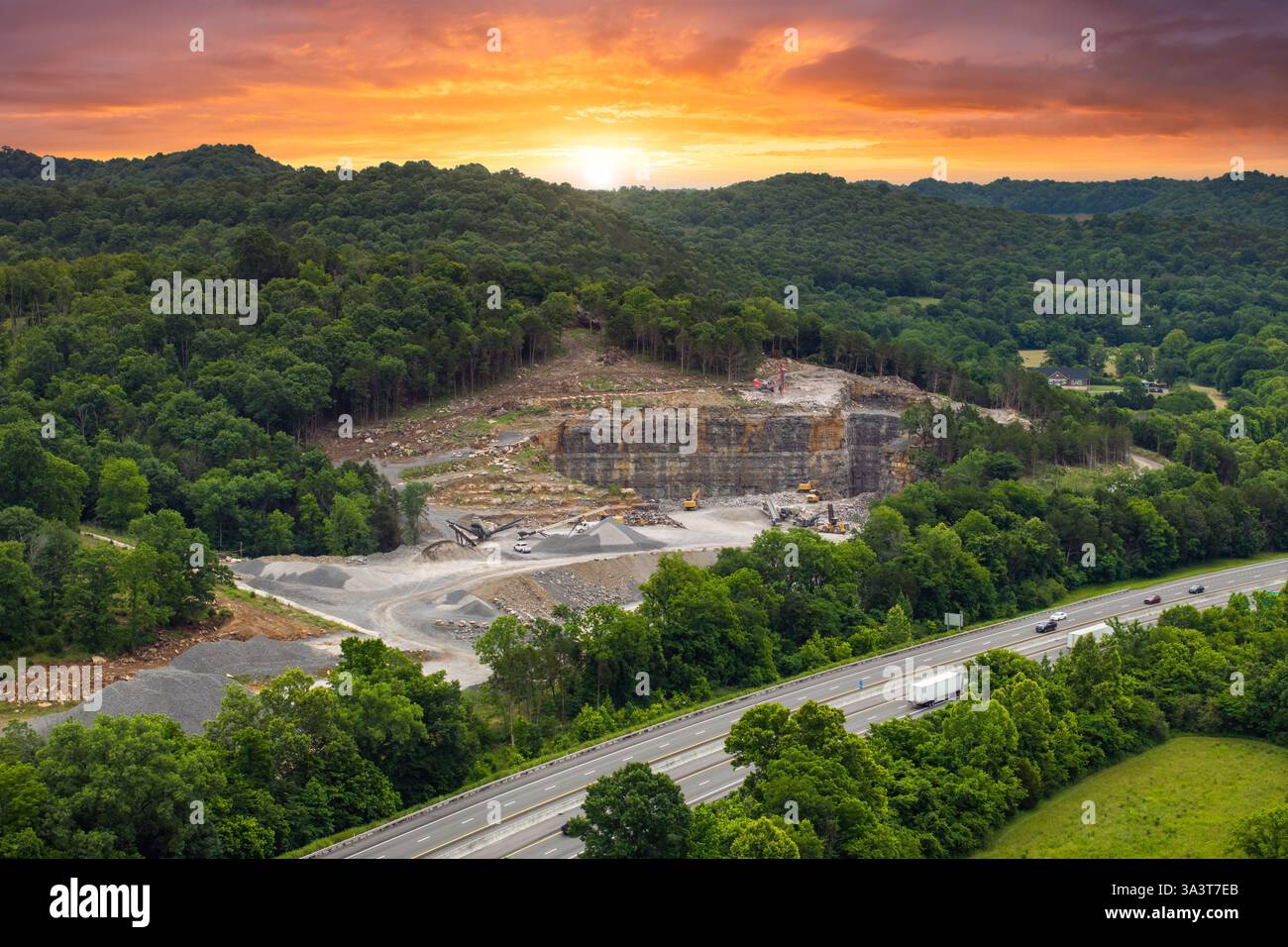 Industrial open-pit mining site with limestone quarry at mountain ...