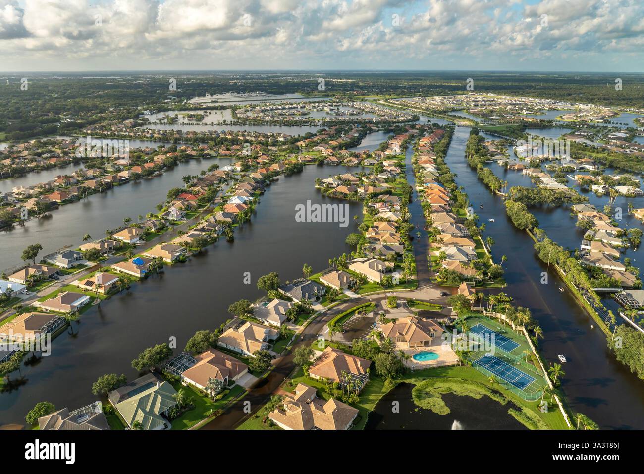 Flooded residential area with underwater houses from hurricane rainfall ...
