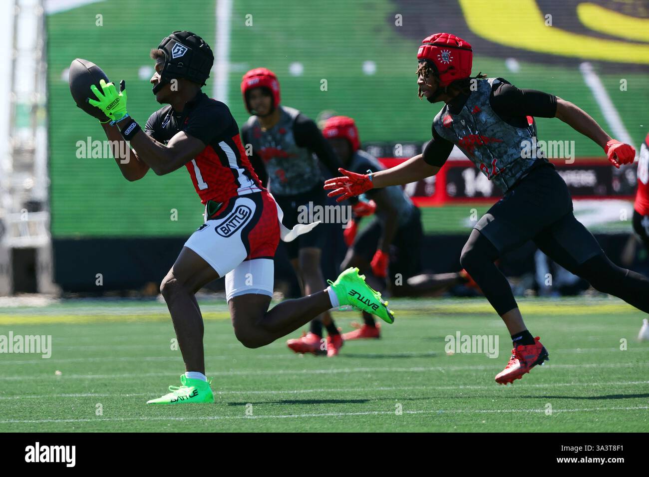 RG3 Takeover wide receiver Chris Stewart (1) makes a catch ahead of ...