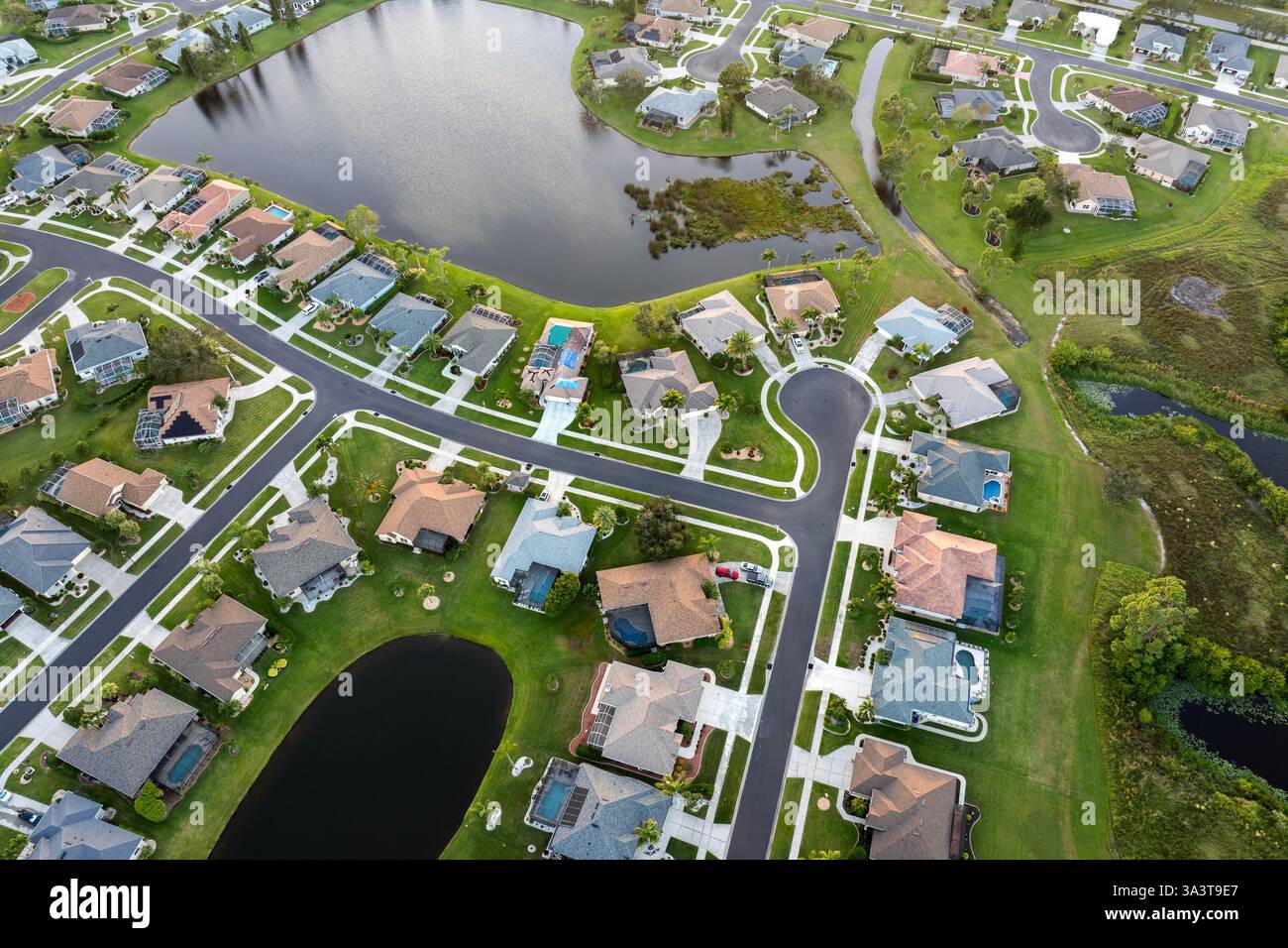 Residential homes in suburban sprawl development in North Port, Florida ...