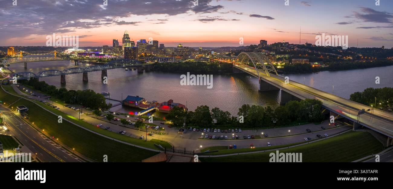 Highway traffic with driving cars on bridge in downtown district of ...