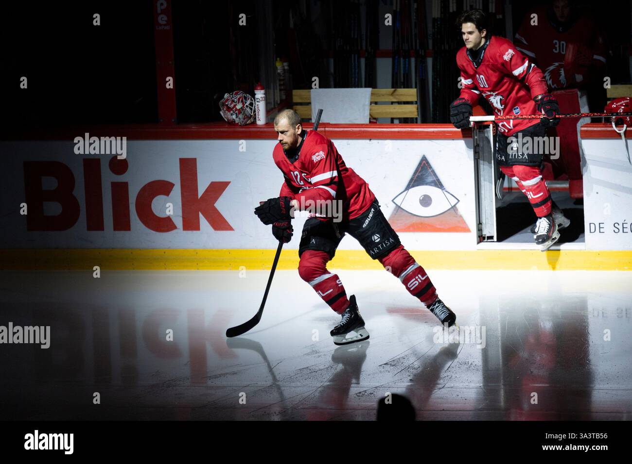 Lausanne, Switzerland. , . Michael Raffl (offense) of Lausanne HC #12 enters the arena during ...