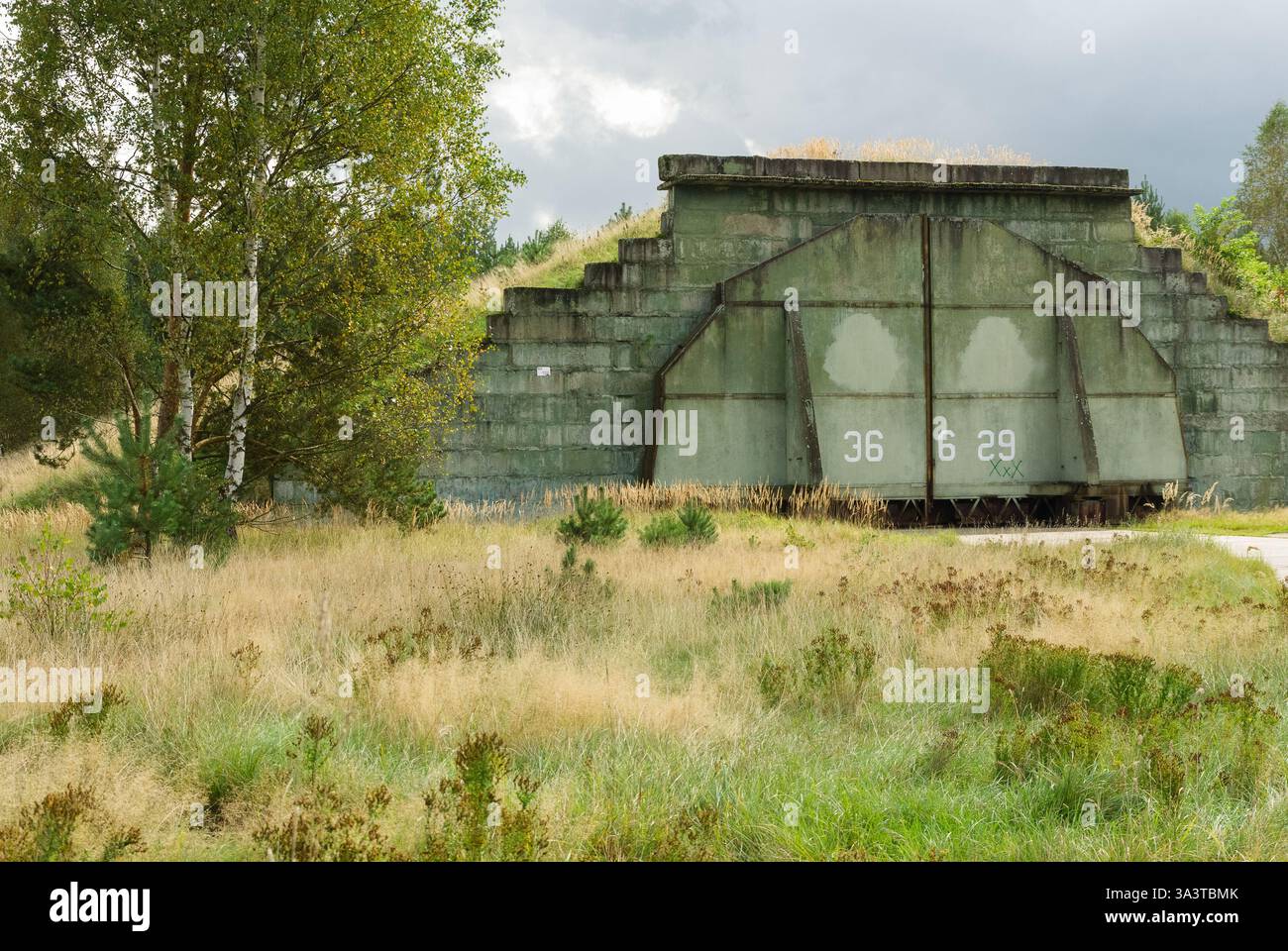 Abandoned cold war Soviet era concealed military aircraft hangar, Mimoň ...