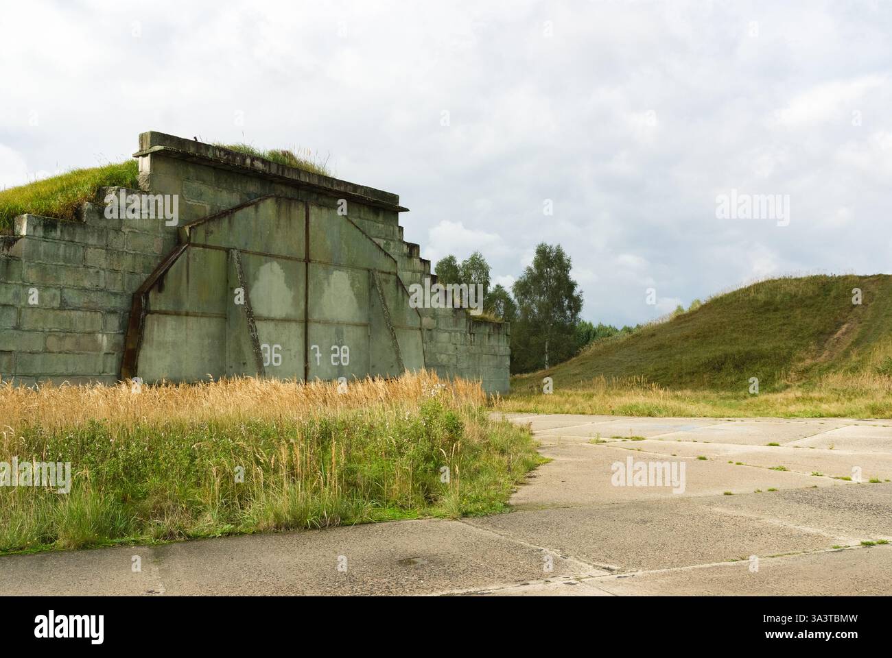 Abandoned cold war Soviet era concealed military aircraft hangar, Mimoň ...