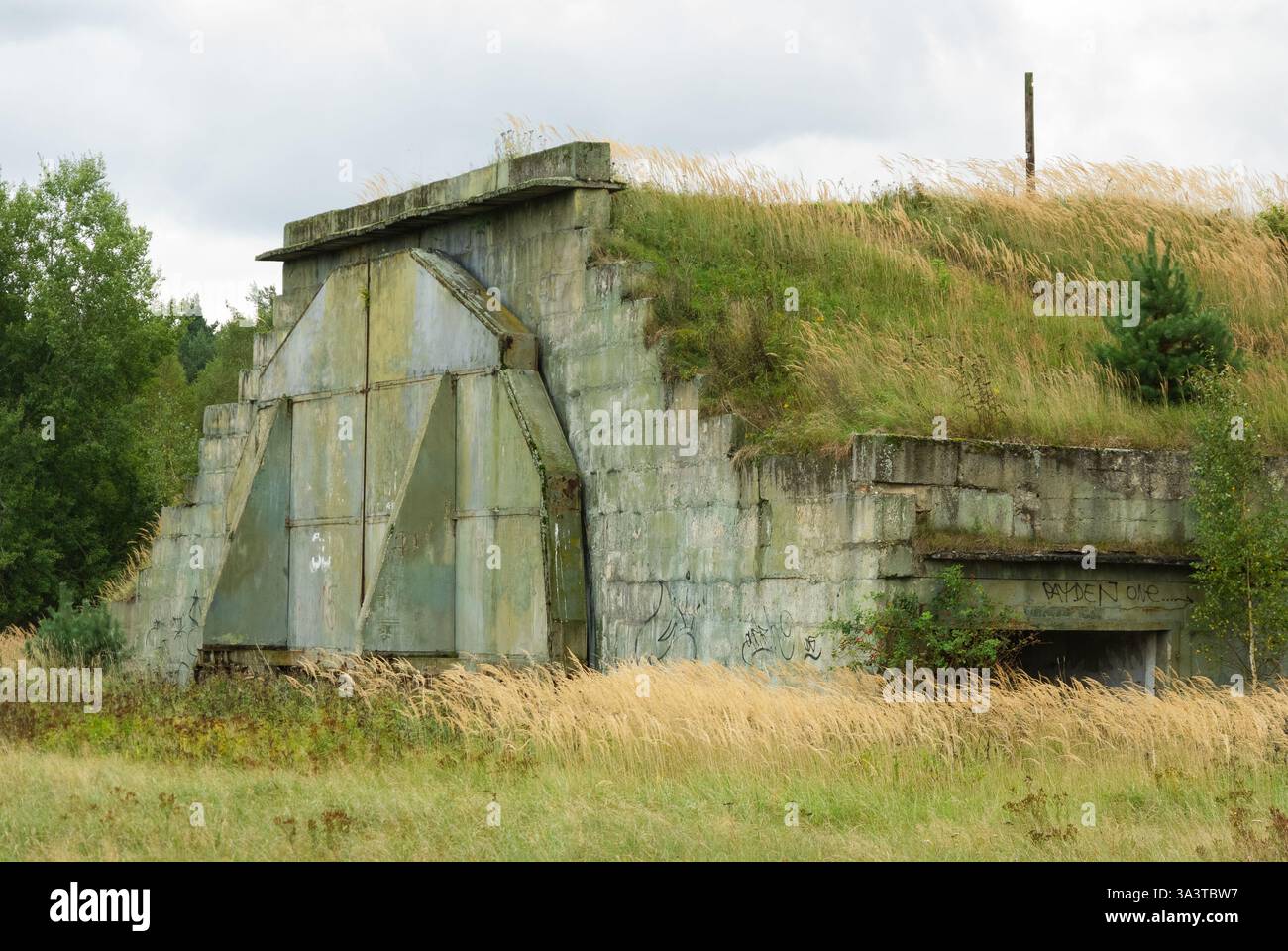 Abandoned cold war Soviet era concealed military aircraft hangar, Mimoň ...