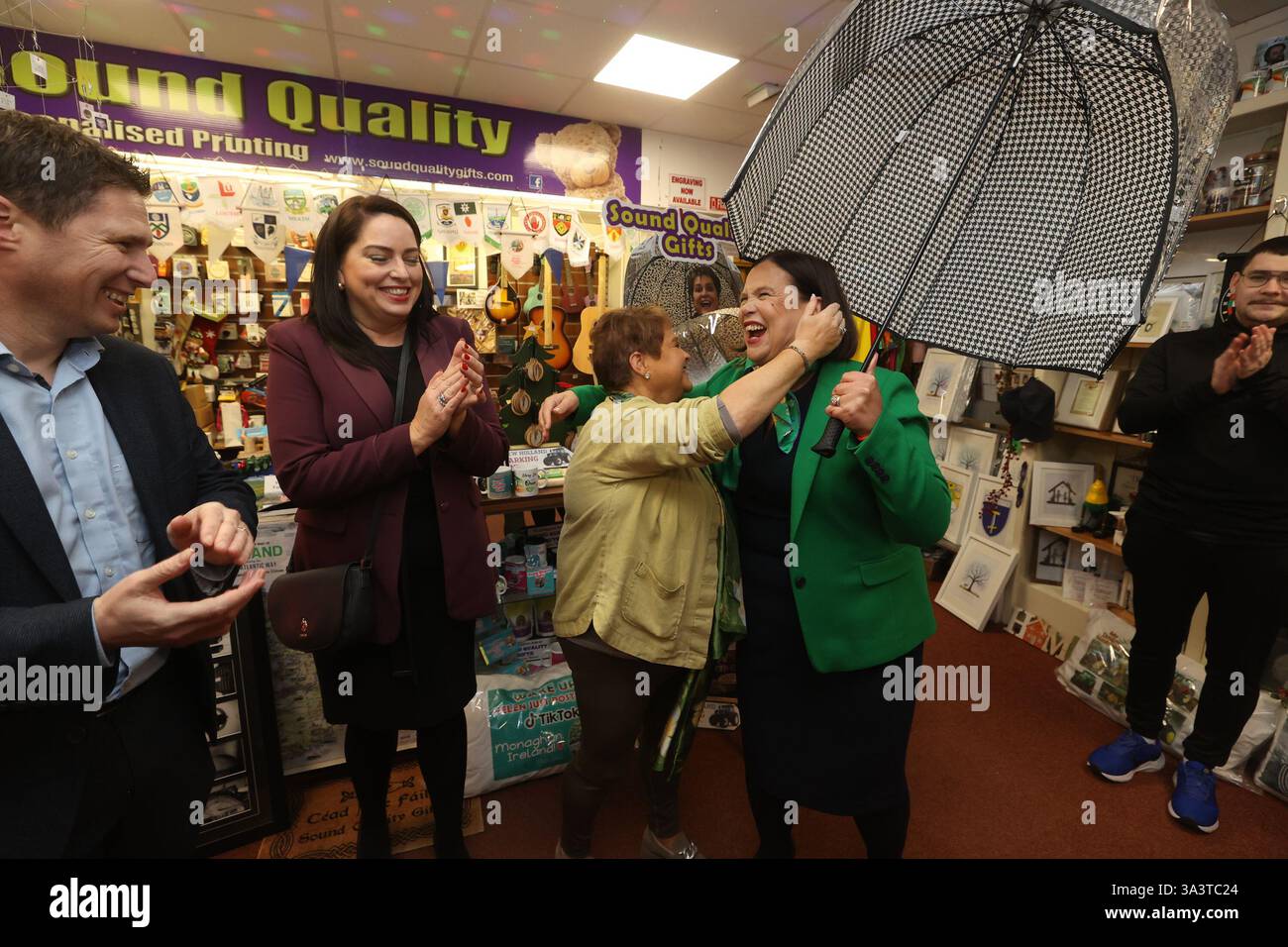 Sinn Fein President Mary Lou McDonald is embraced by shop owner Helen ...