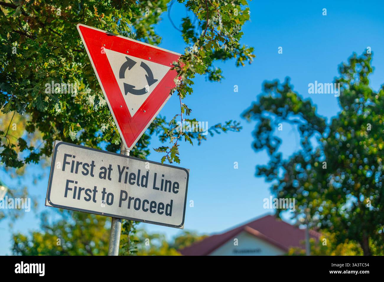 Sign for the right of way in south african roundabouts, which work in a ...