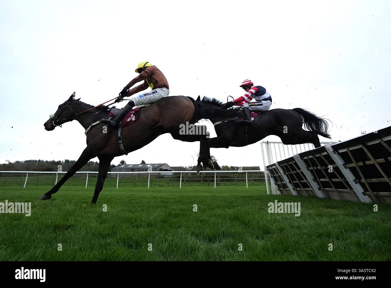 Gentleman Bill ridden by Henry Brooke (left) on their way to winning ...