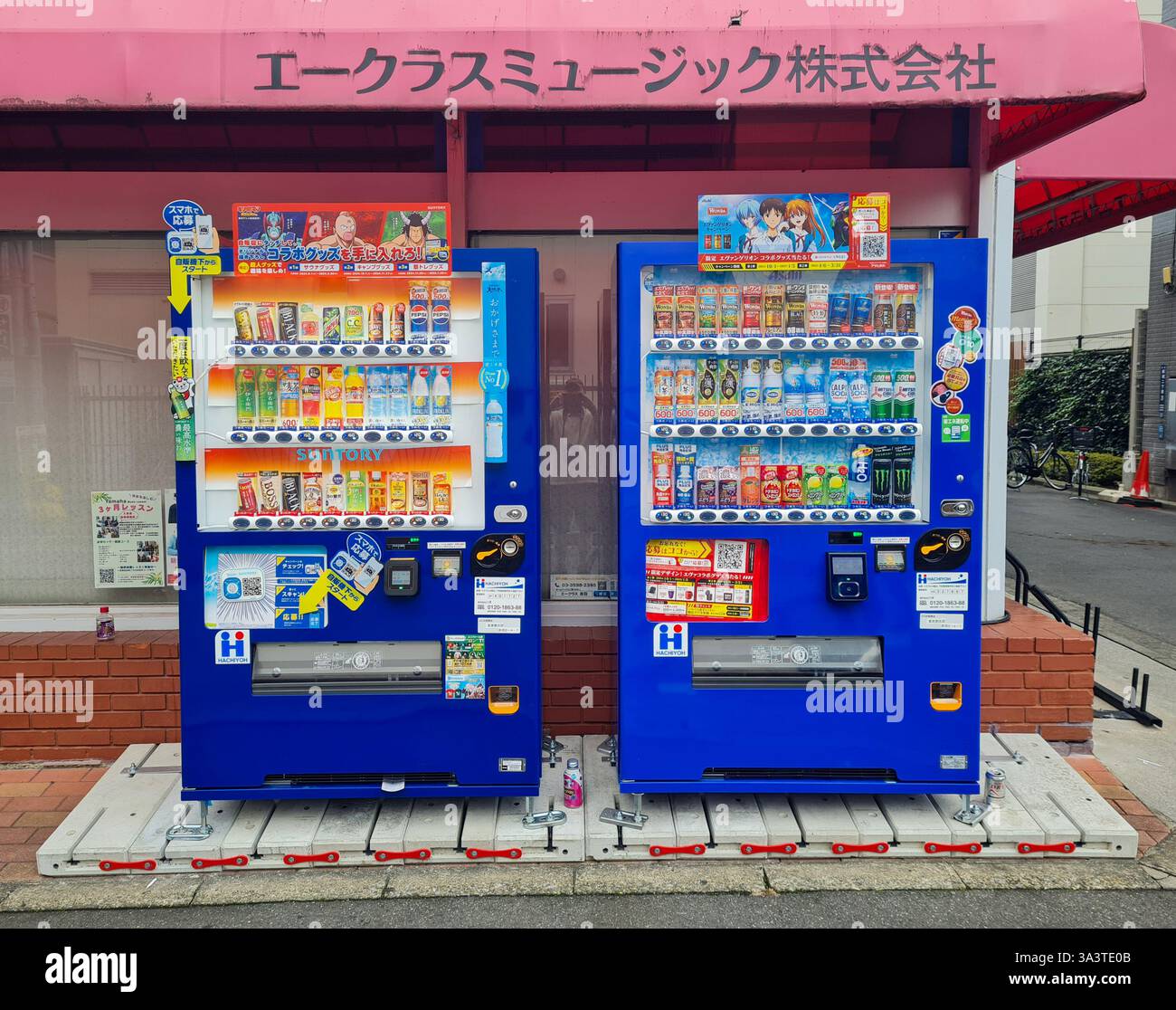Two blue drink vending machines on a sidewalk in Tokyo, Japan Stock ...
