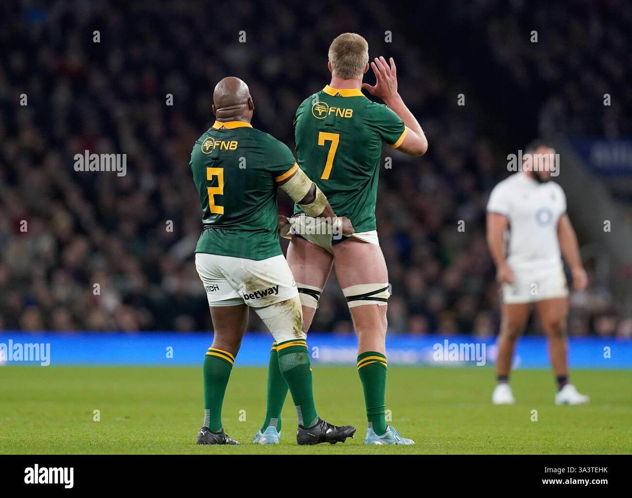 South Africa's Mbongeni Mbonambi (left) prepares to lift South Africa's ...