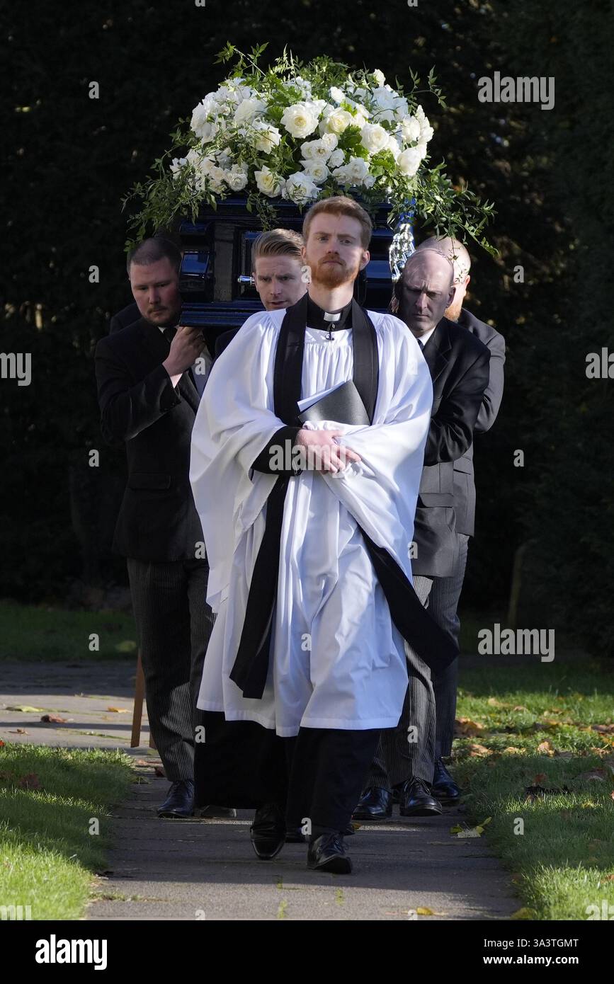 Liam Payne's coffin is carried by pallbearers after the funeral service ...