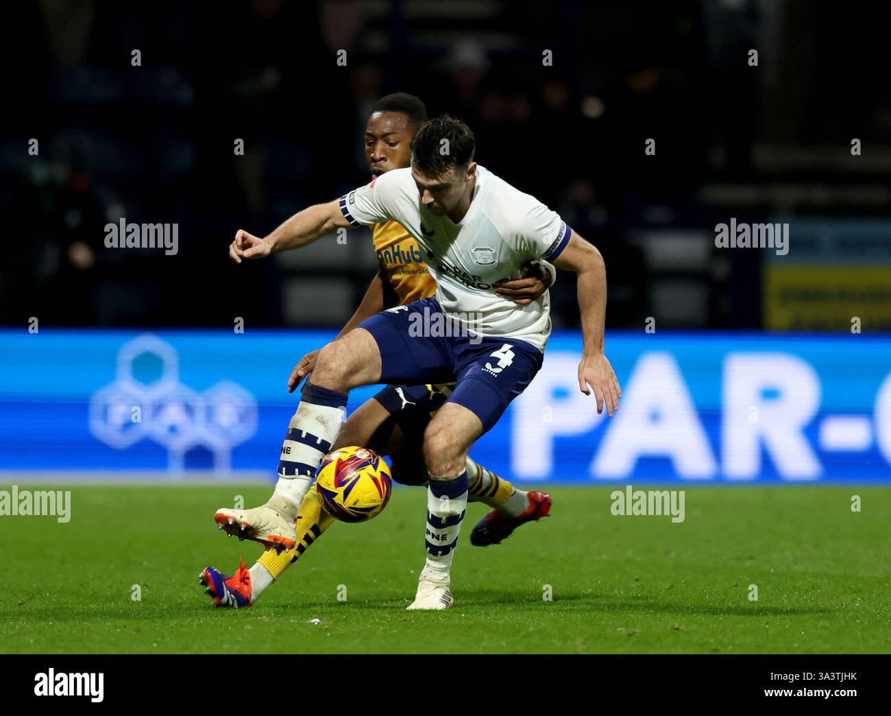 Preston North End's Ben Whiteman (front) and Derby County's Ebou Adams ...