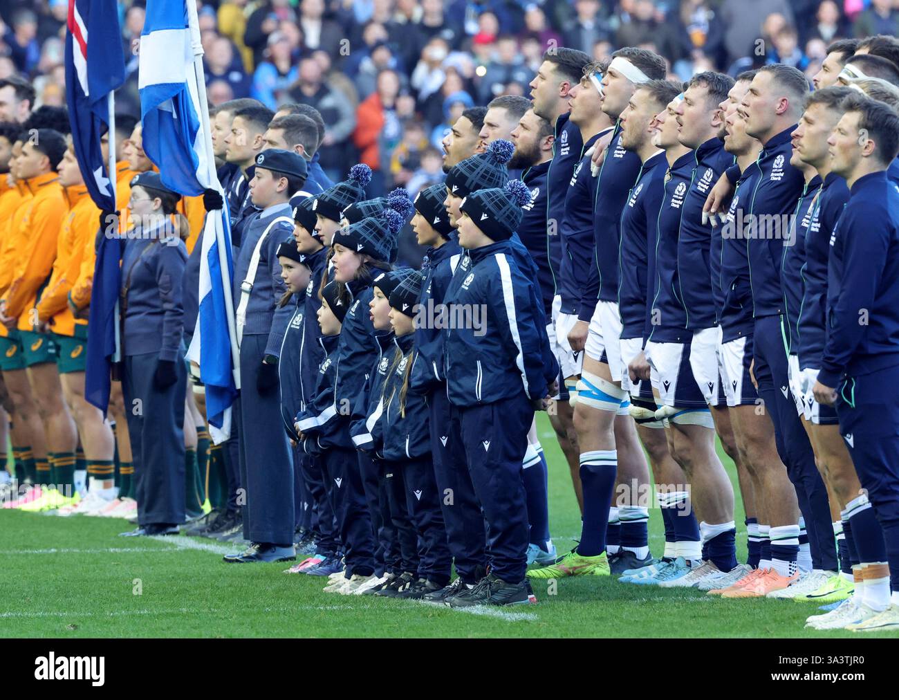 Scotland's players sing the national anthem before the Autumn ...