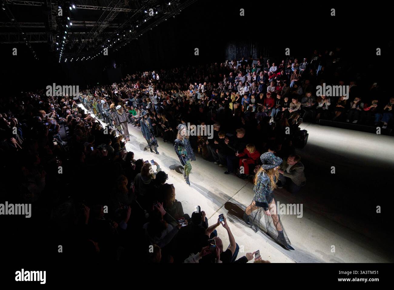 Models wear creations by Russian designer Igor Gulyaev during the ...