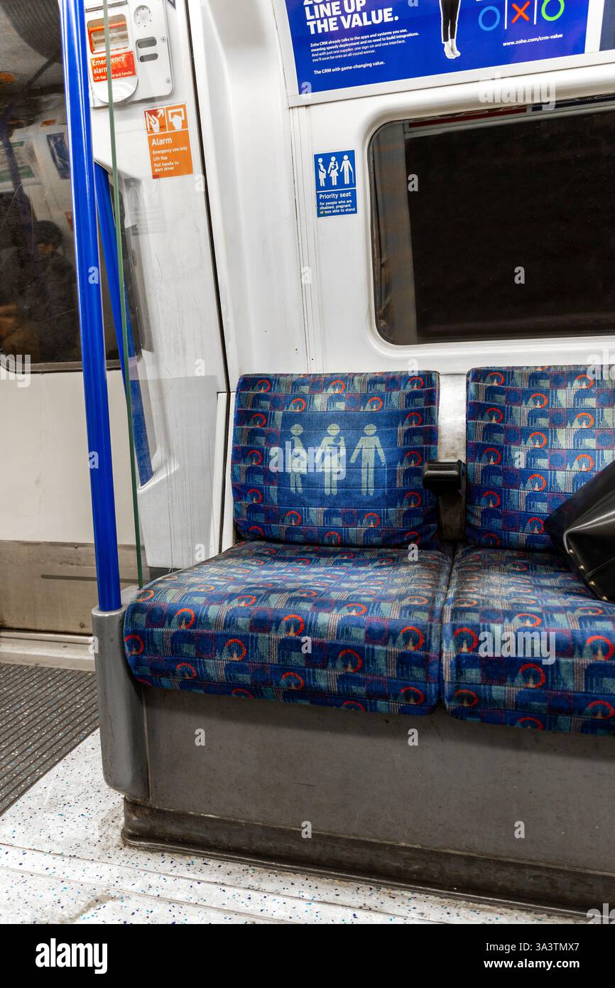 London, UK- September 19, 2024: Priority seat signs in London's ...