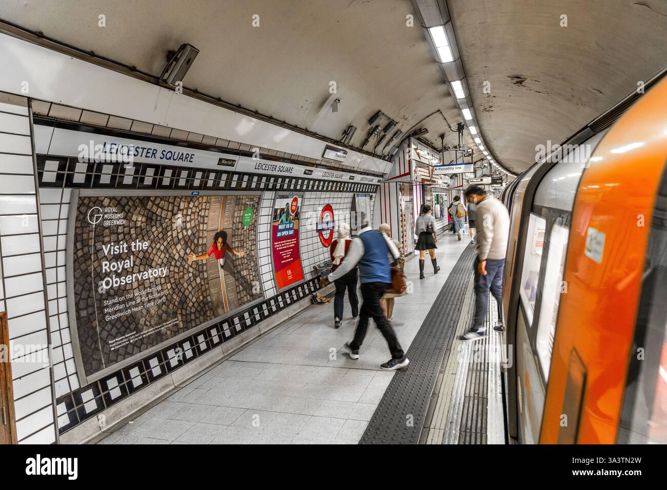 London, UK- September 19, 2024: Busy Leicester Square Tube underground ...