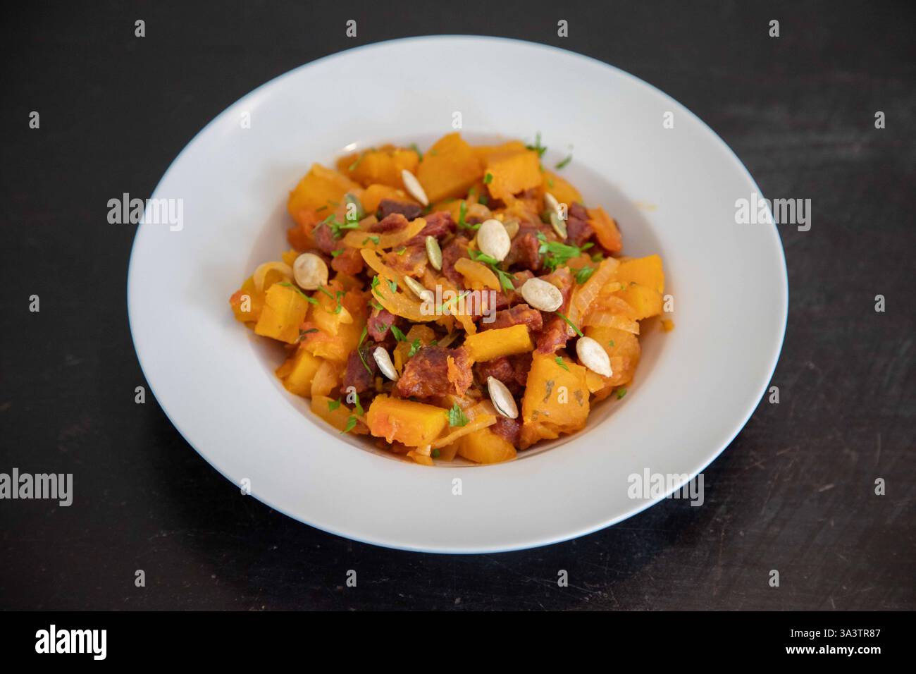 Traditional dried meat with pumpkin known in Brazil as jabá com jerimum ...