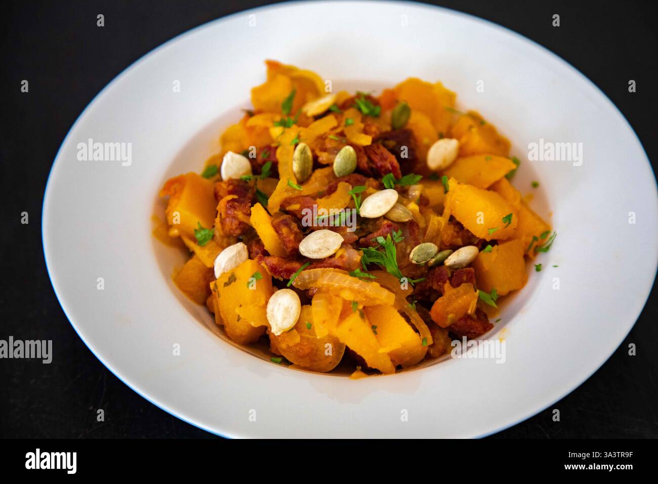 Traditional dried meat with pumpkin known in Brazil as jabá com jerimum ...