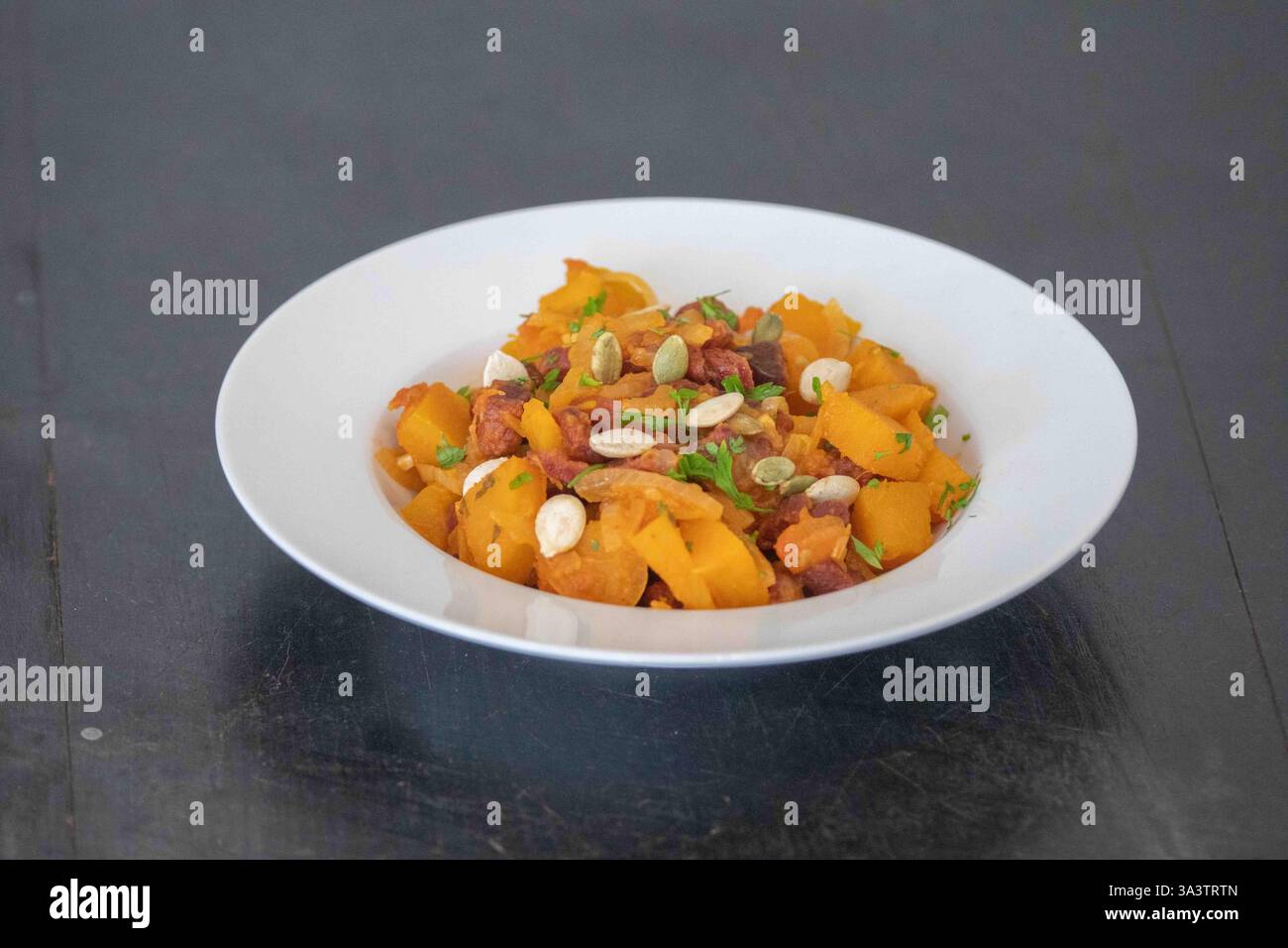 Traditional dried meat with pumpkin known in Brazil as jabá com jerimum ...