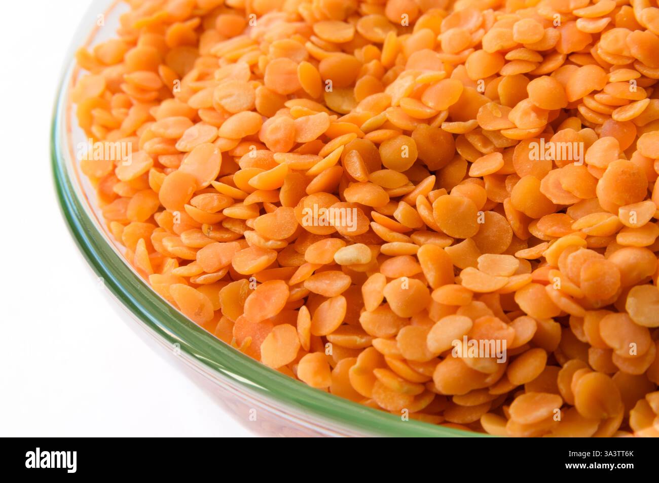 Raw dal in a glass bowl on a white background Stock Photo - Alamy