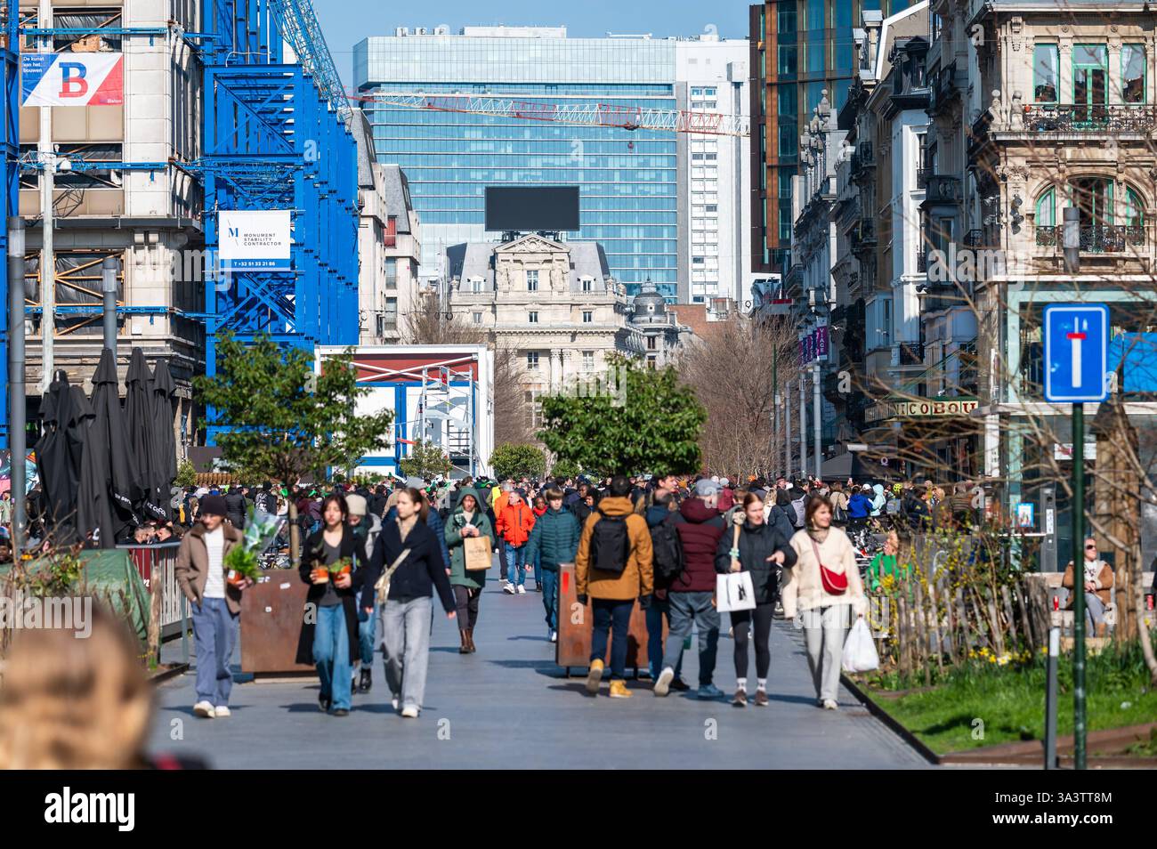 People walking on the pedestrian zine of Boulevard Anspach, Brussels ...