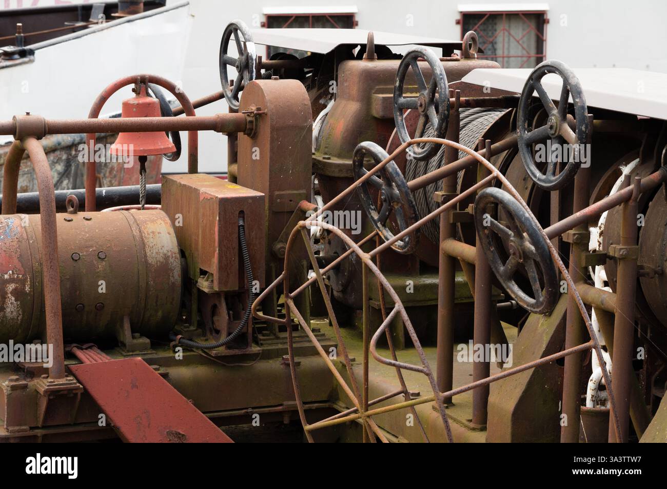 Machine for winding steel cable with lots of various wheels Stock Photo ...