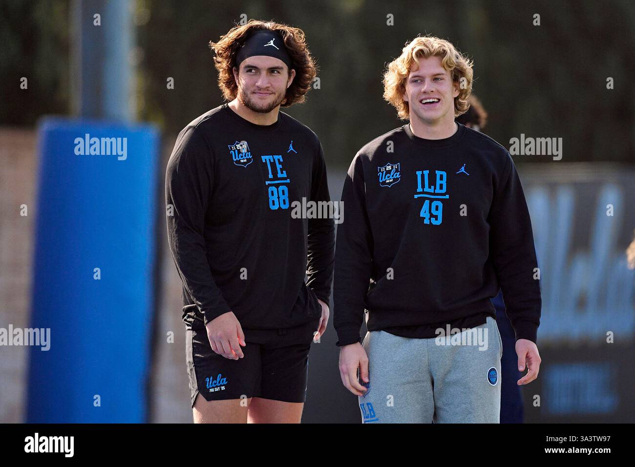 UCLA linebacker Carson Schwesinger, right, and tight end Moliki Matavao ...