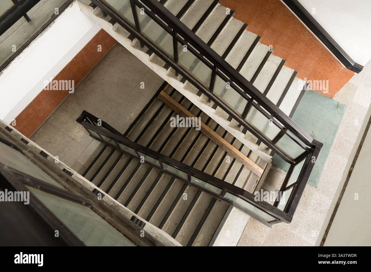 Top down perspective of unkept staircase in apartment building Stock ...