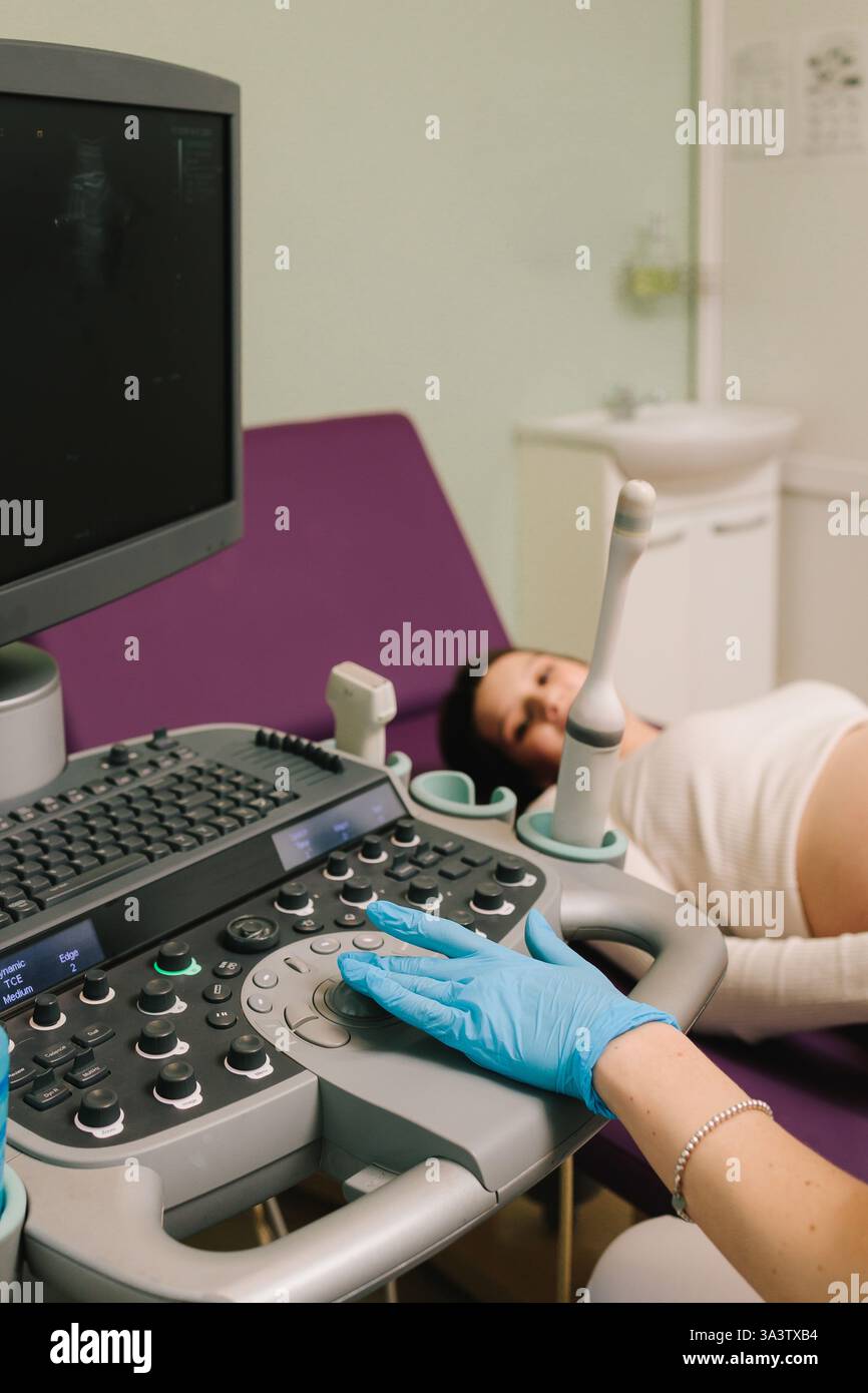Checking fetus health at the gynecology hospital. Gynecologist uses ...
