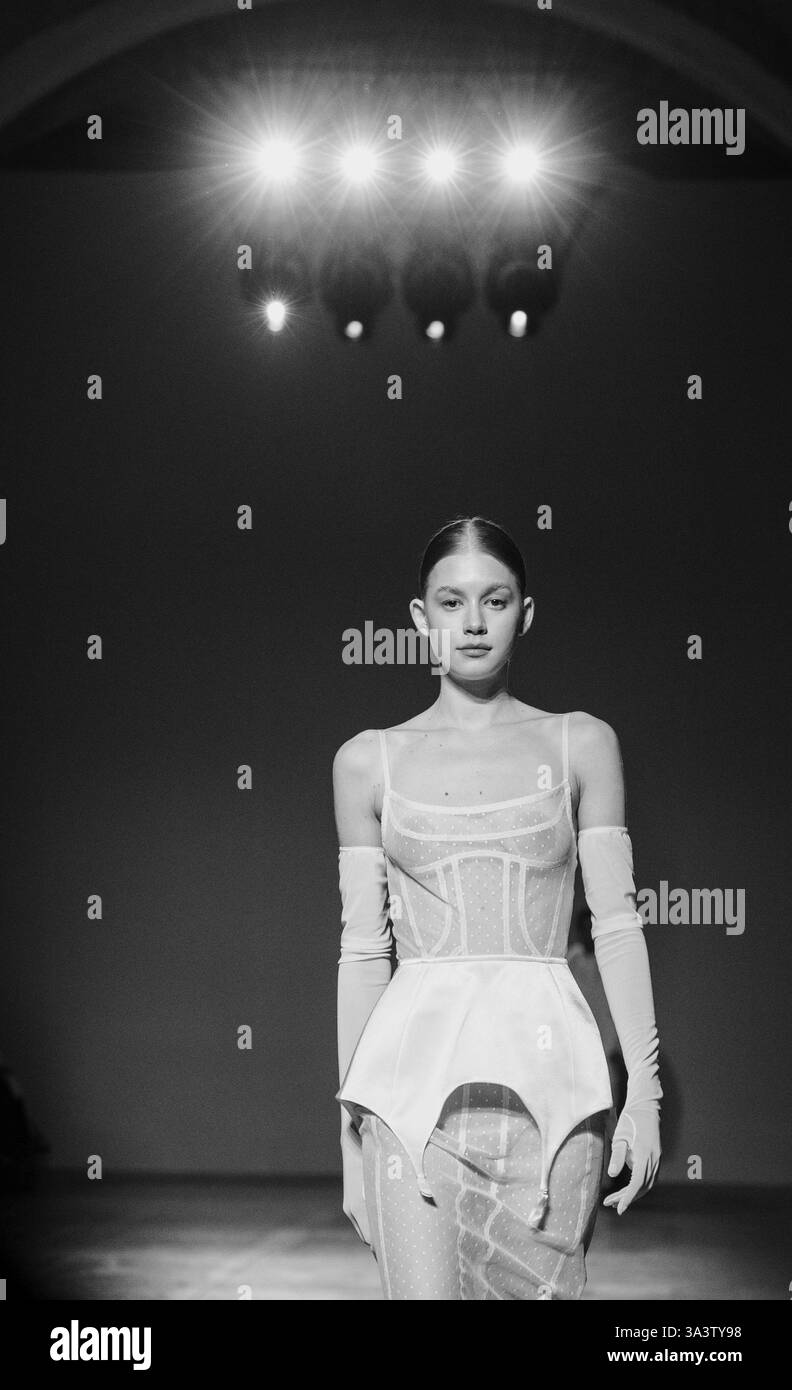 Kyiv, Ukraine - 14th February 2025: model strides confidently down the ...