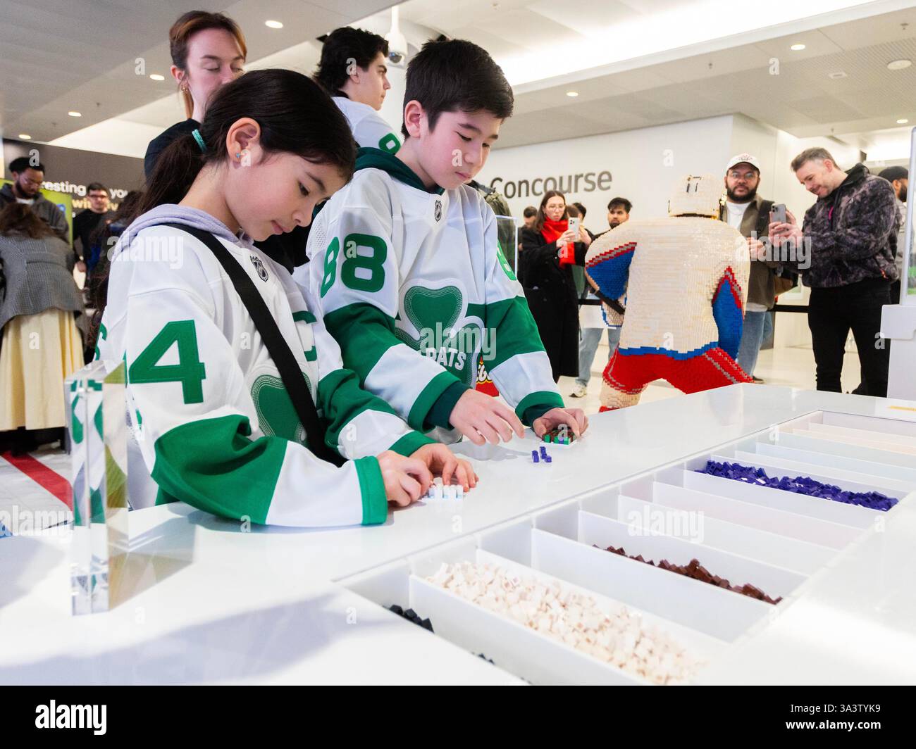 Toronto, Canada. 17th Mar, 2025. Children take part in a LEGO Mural ...