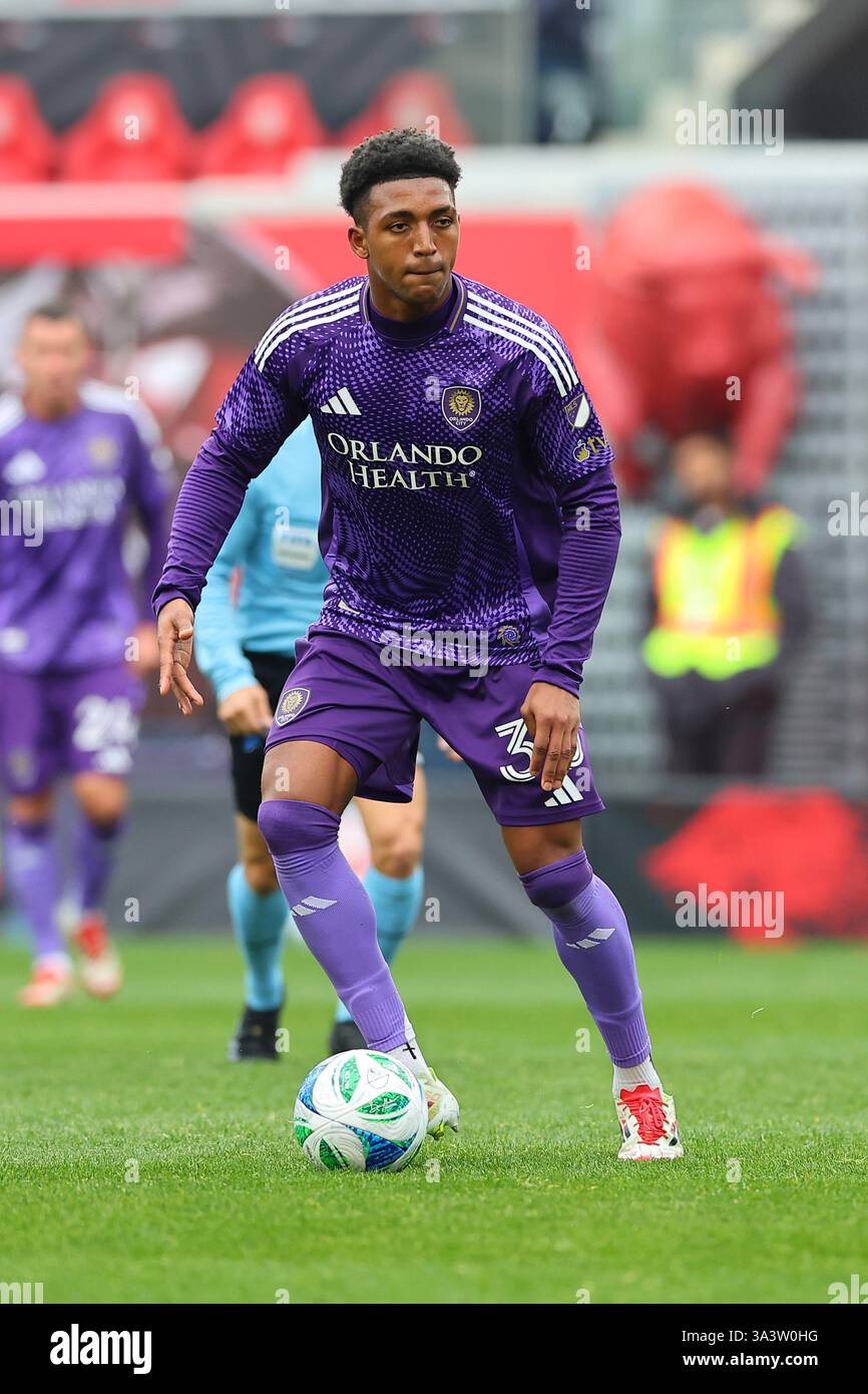 HARRISON, NJ - MARCH 15: Alex Freeman #30 of Orlando City controls the ...