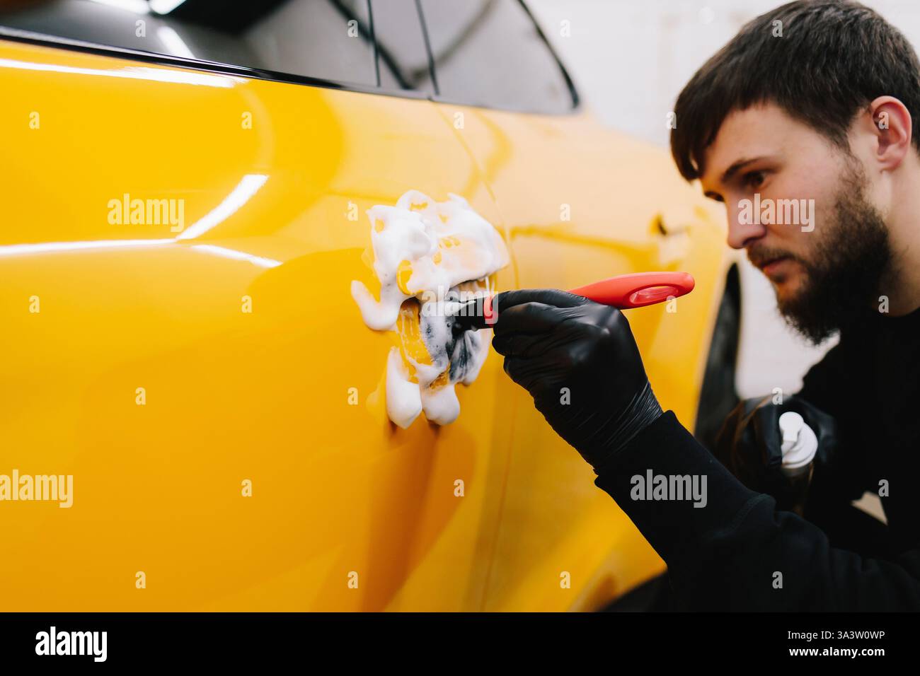 Car handle washing with microfiber and detergent in detailing auto ...