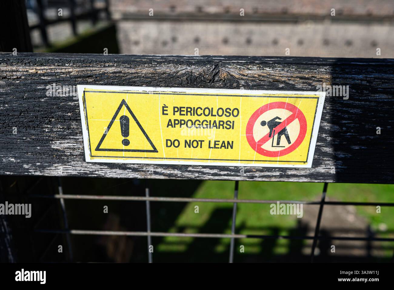 Do Not Lean Sign on fence inside the Castello Sforzesco (Sforza Castle ...