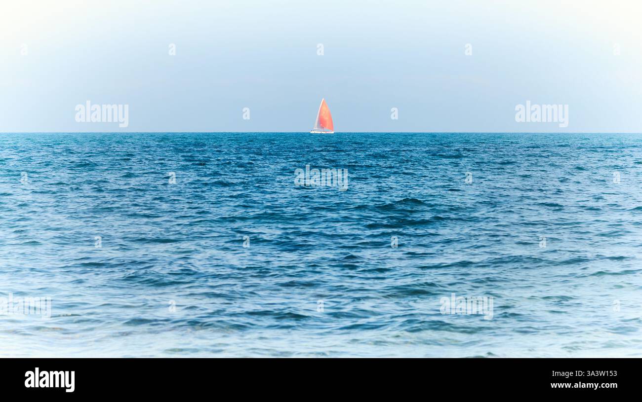 Distant boat hi-res stock photography and images - Alamy