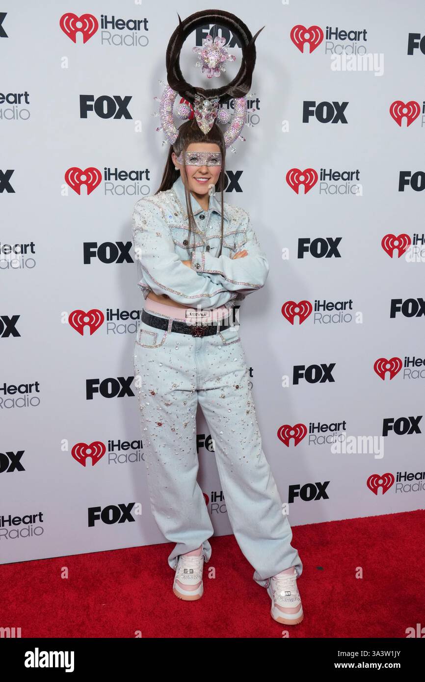 JoJo Siwa arrives at the iHeartRadio Music Awards, Monday, March 17, 2025, at the Dolby Theatre ...