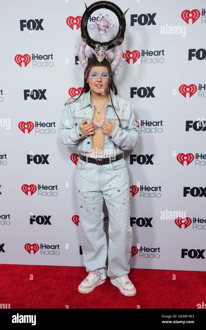 JoJo Siwa arrives at the iHeartRadio Music Awards, Monday, March 17, 2025, at the Dolby Theatre ...