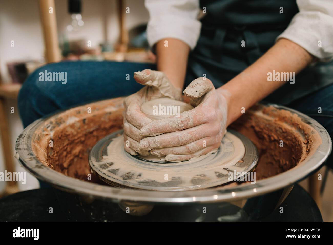 Process of making ceramic earthenware on the spinning wheel in the ...