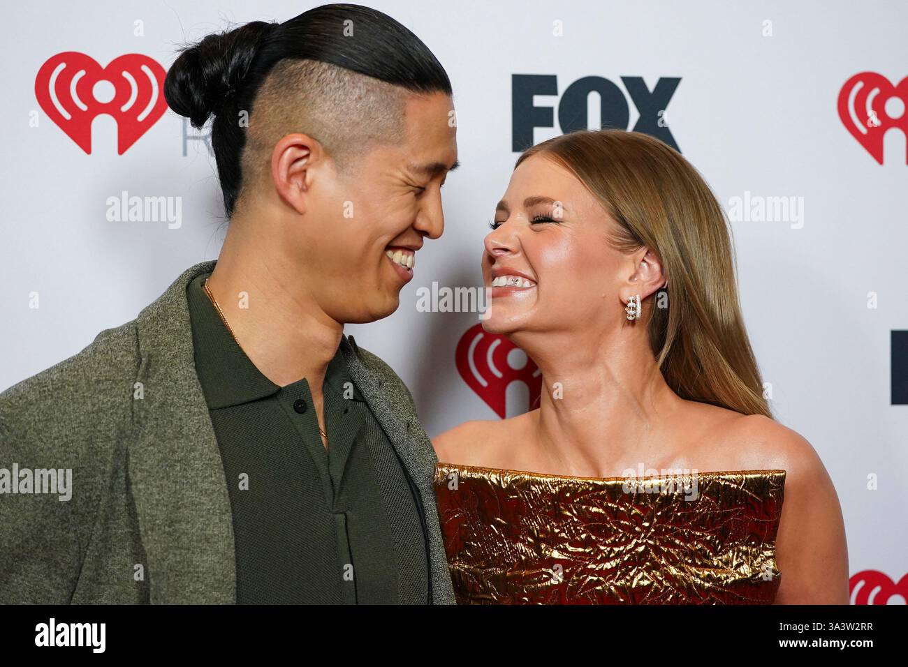Daniel Wai, left, and Ariana Madix arrive at the iHeartRadio Music ...