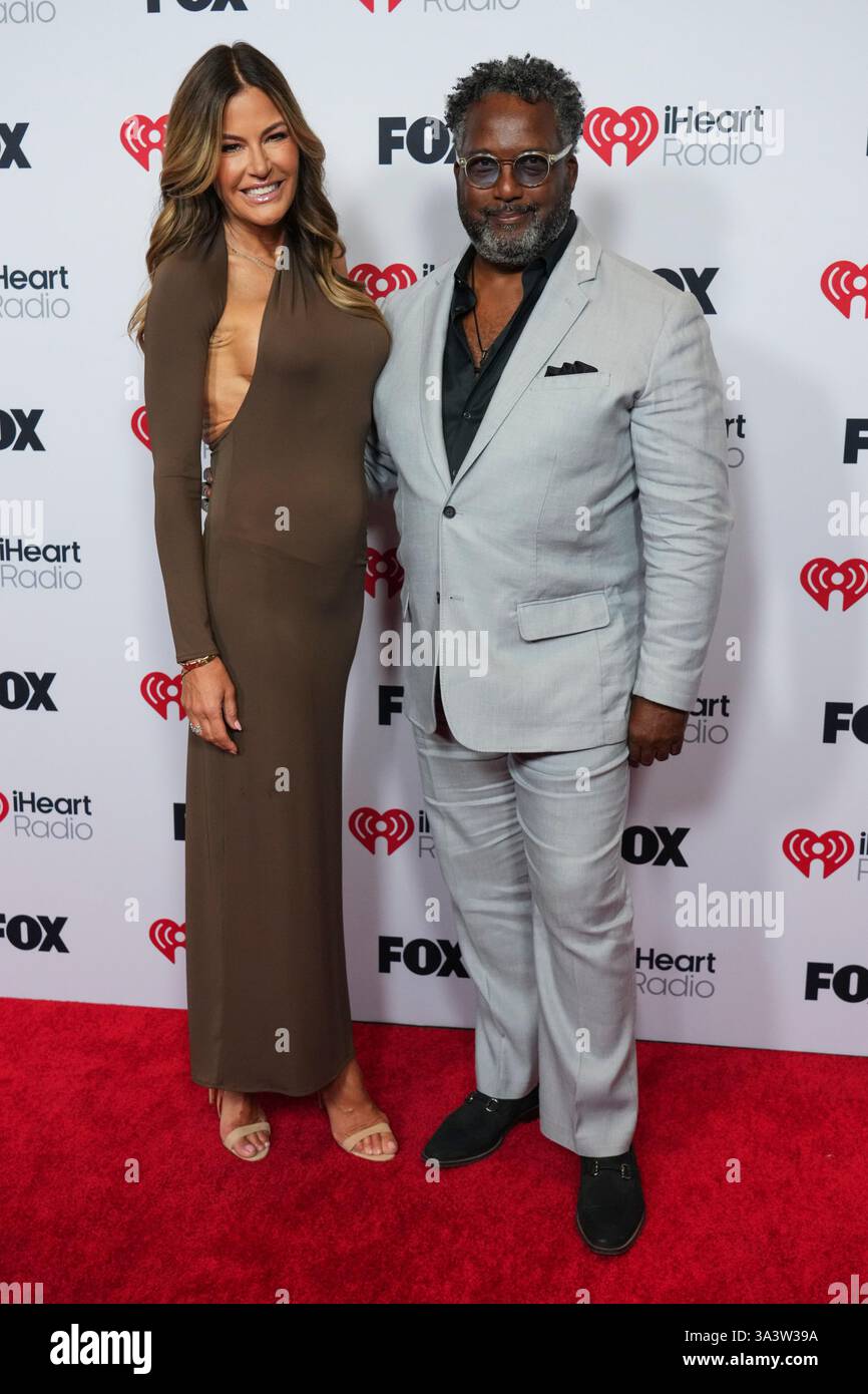 Kelly Killoren Bensimon, left, and Gary Levingston arrive at the ...