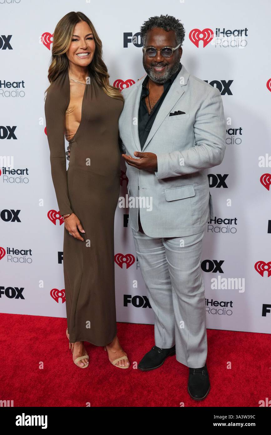 Kelly Killoren Bensimon, left, and Gary Levingston arrive at the ...