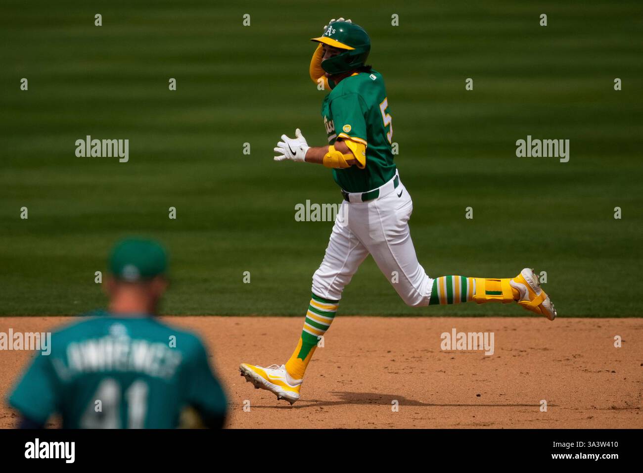 Athletics' Jacob Wilson rounds the bases after hitting a three run home ...