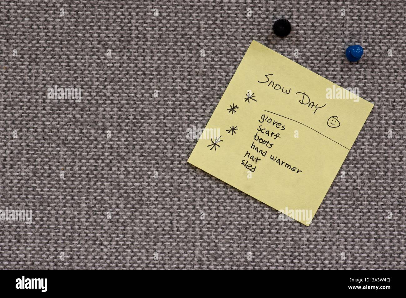 Bulletin board note with list of items for a snow day Stock Photo - Alamy