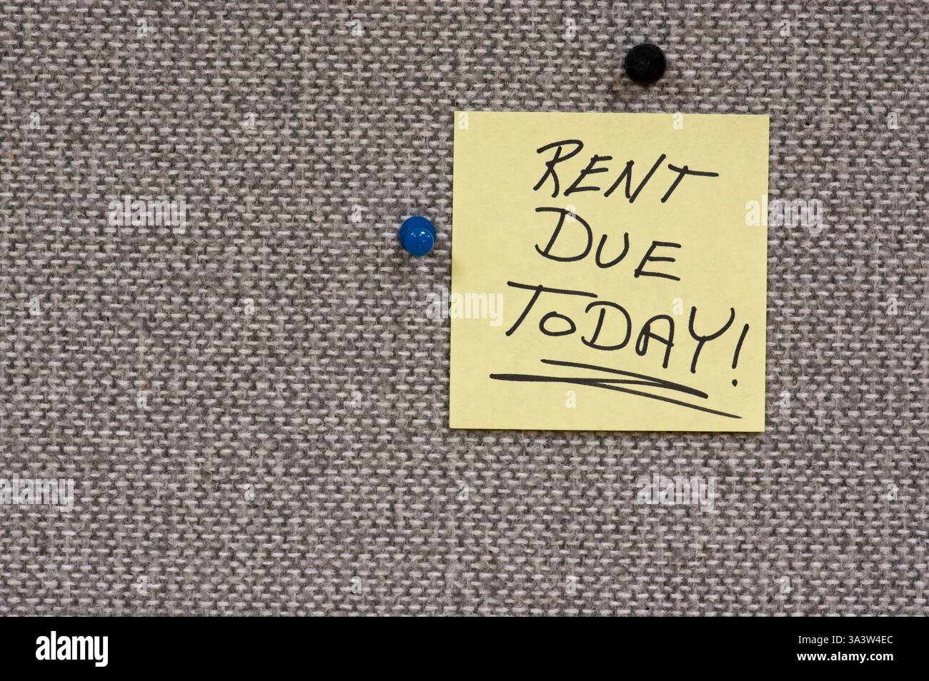 Rent Due Today reminder on a bulletin board Stock Photo - Alamy