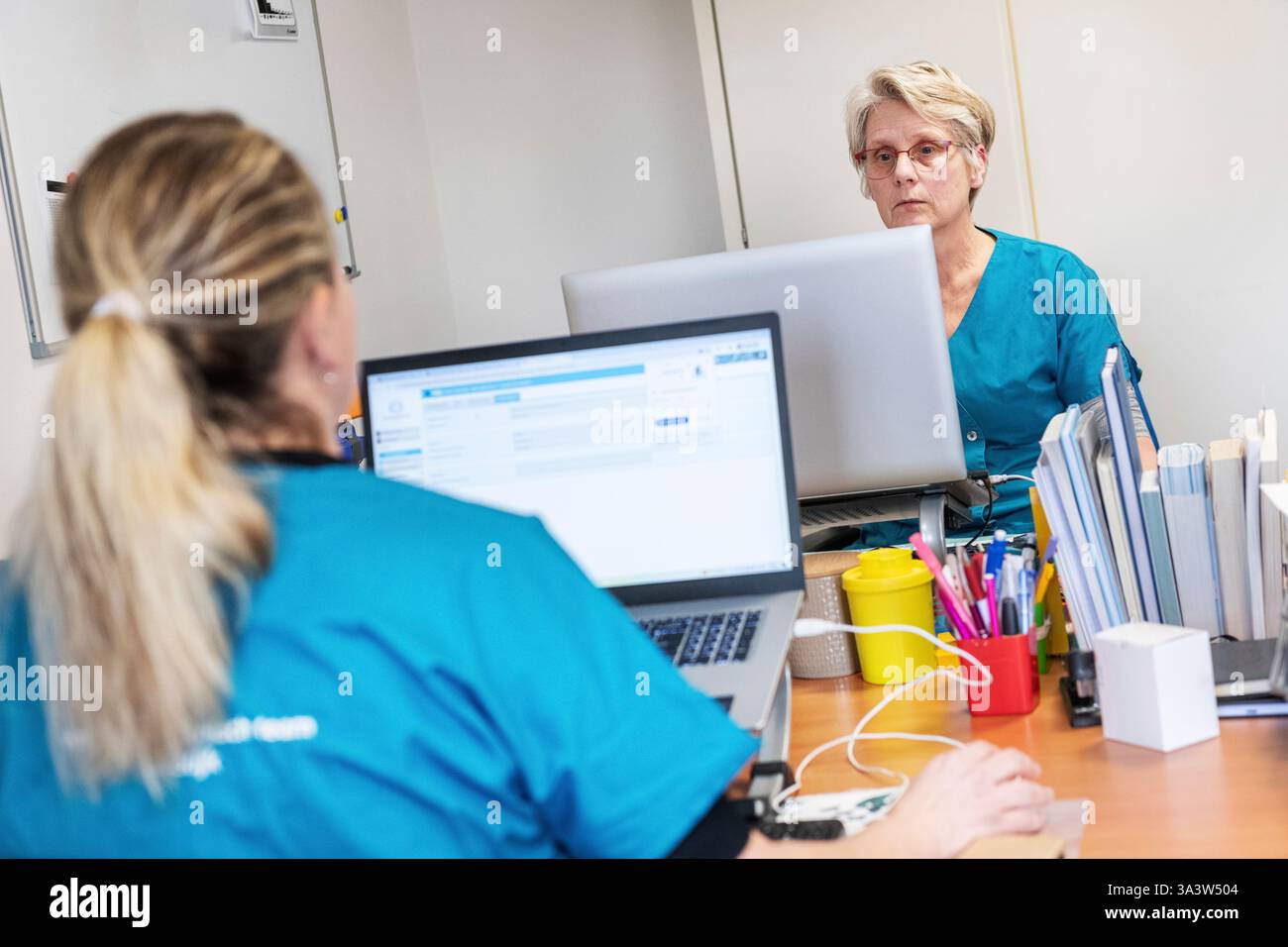Homecare nurses doing administrative tasks Stock Photo - Alamy