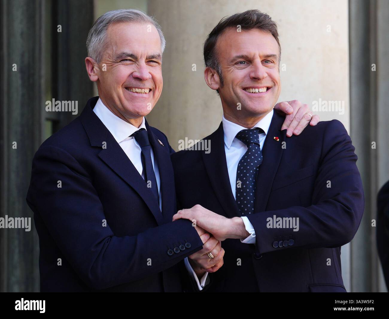 Paris, France. 17th Mar, 2025. Prime Minister Mark Carney, left, is ...