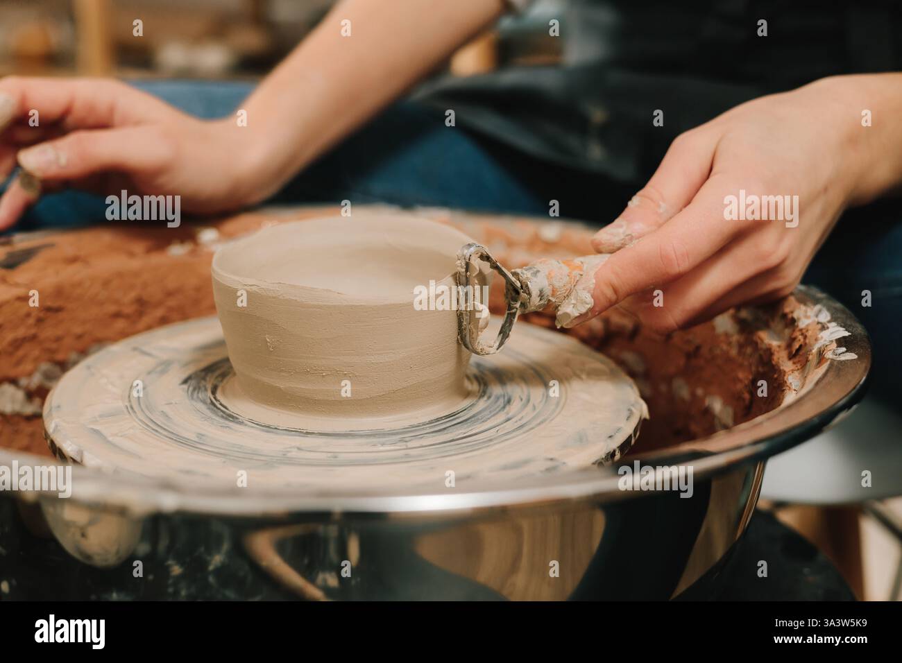 Creating ceramic earthenware on the manufacturing. Artisan forms clay ...