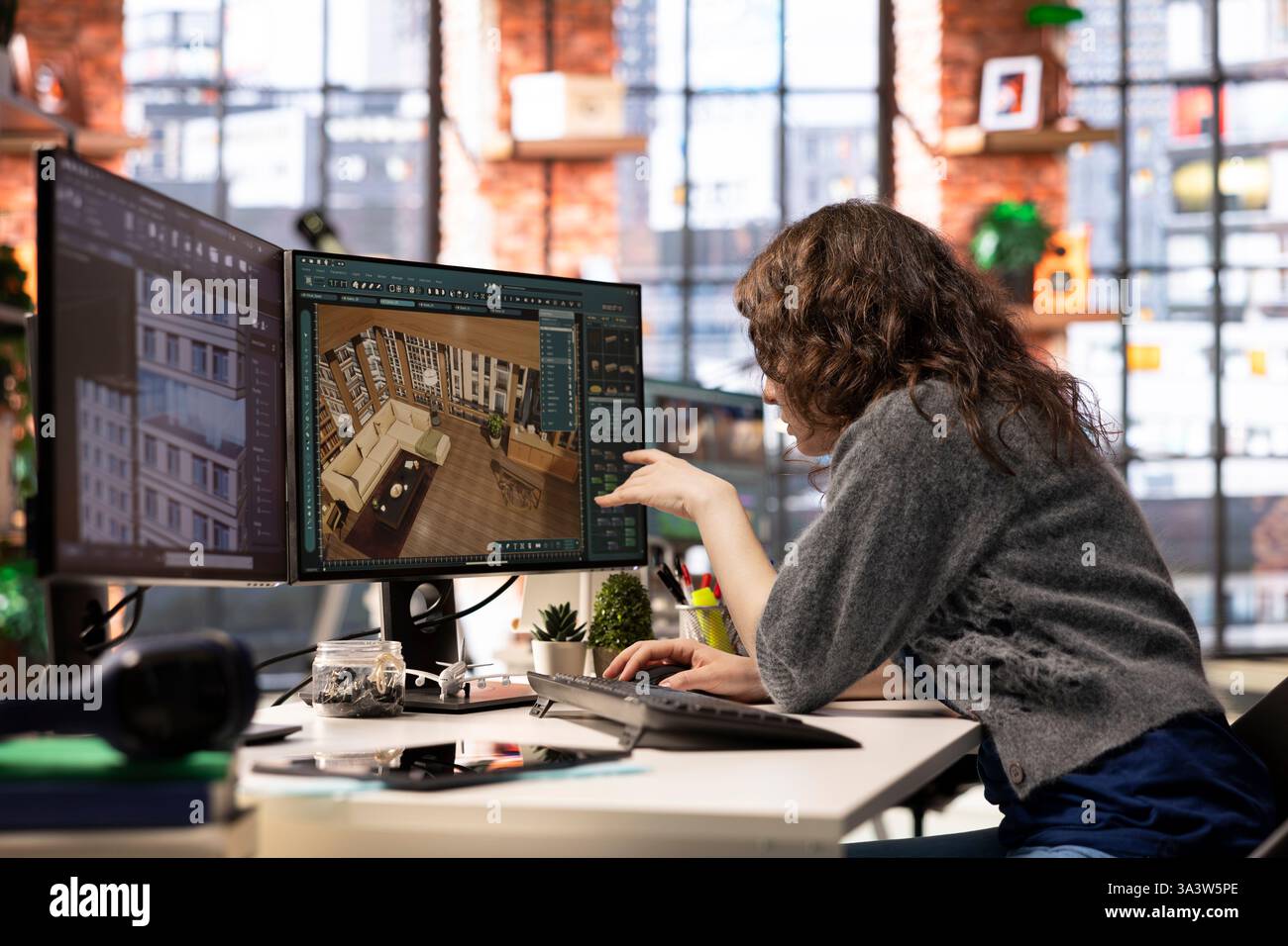 Designer interacts with digital technology to produce a virtual home ...