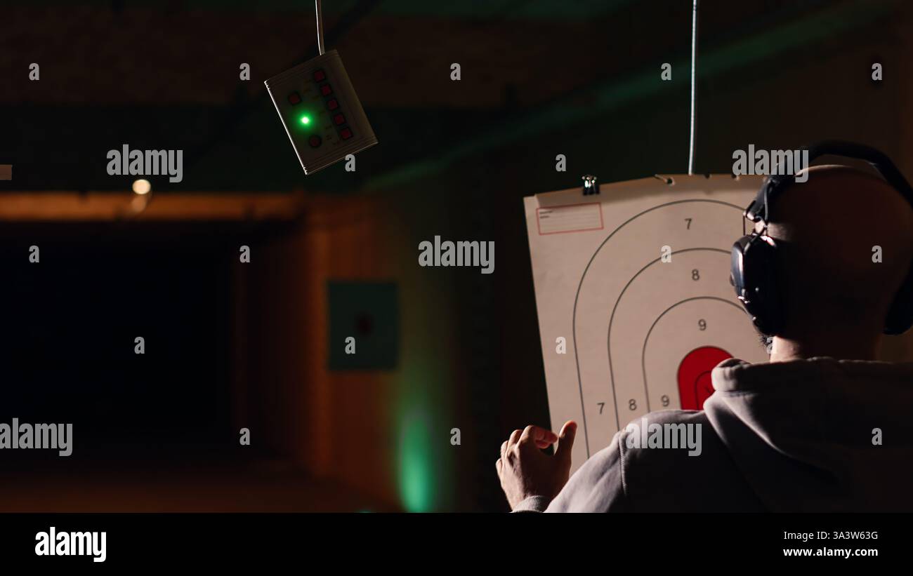 Group of friends in firing range doing recreational shooting activity ...